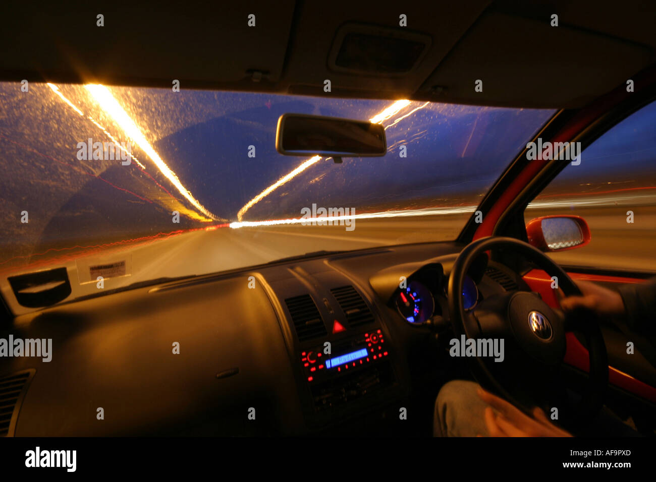 A Stock Photograph of the Inside of a car driving in the night Stock ...