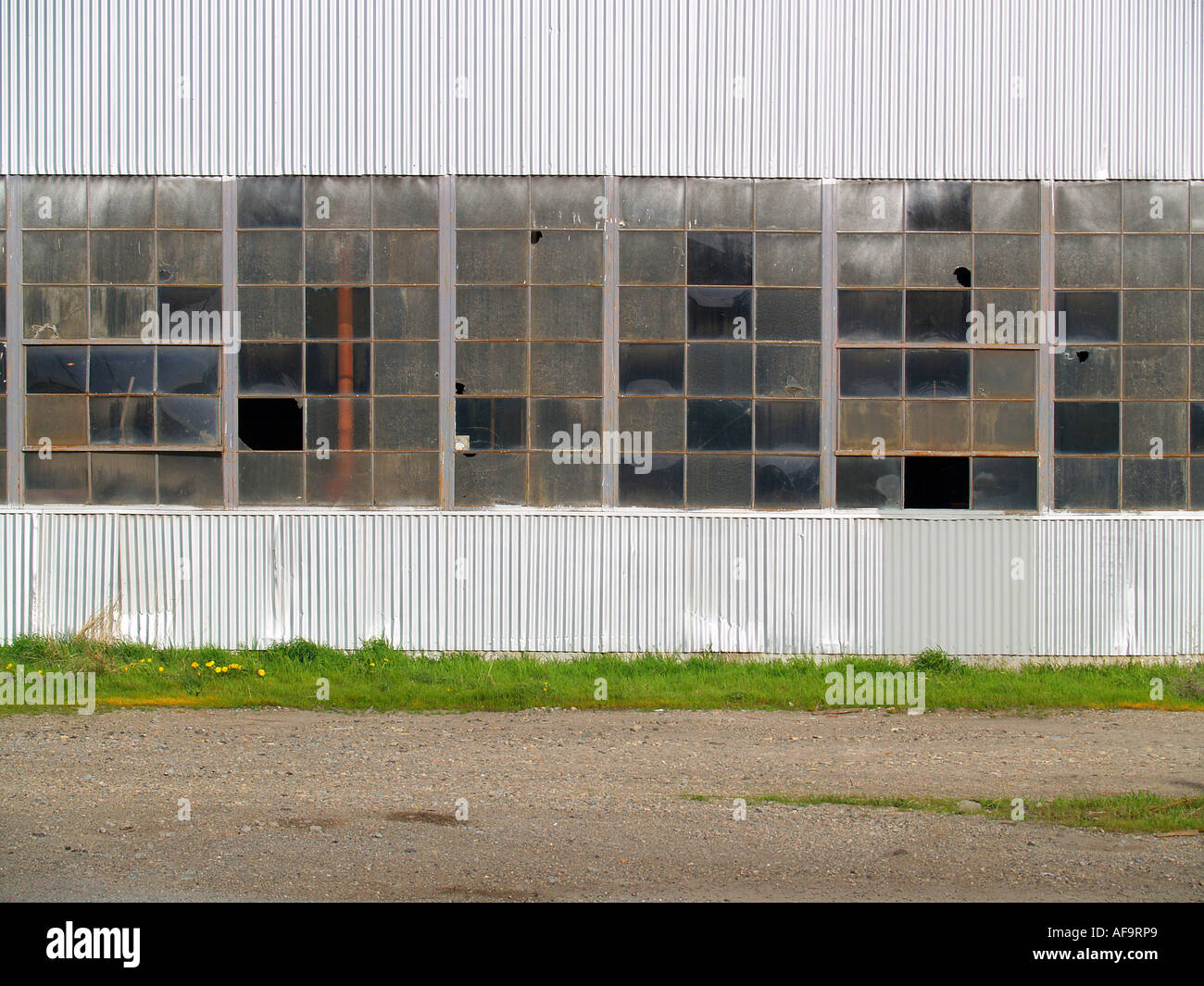 Detail view of windows on the side of a corrugated steel manufacturing ...