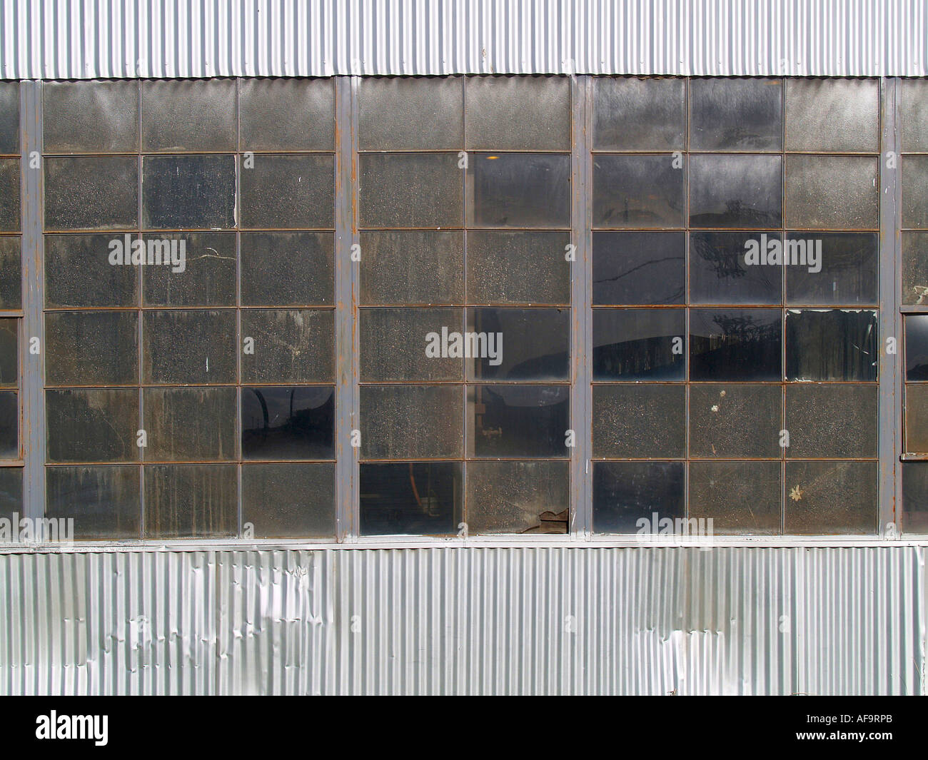 Detail view of windows on the side of a corrugated steel manufacturing ...