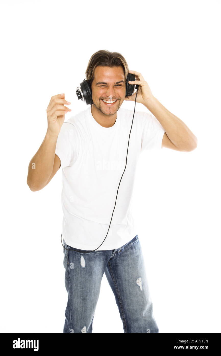 Man using headphones, portrait Stock Photo - Alamy