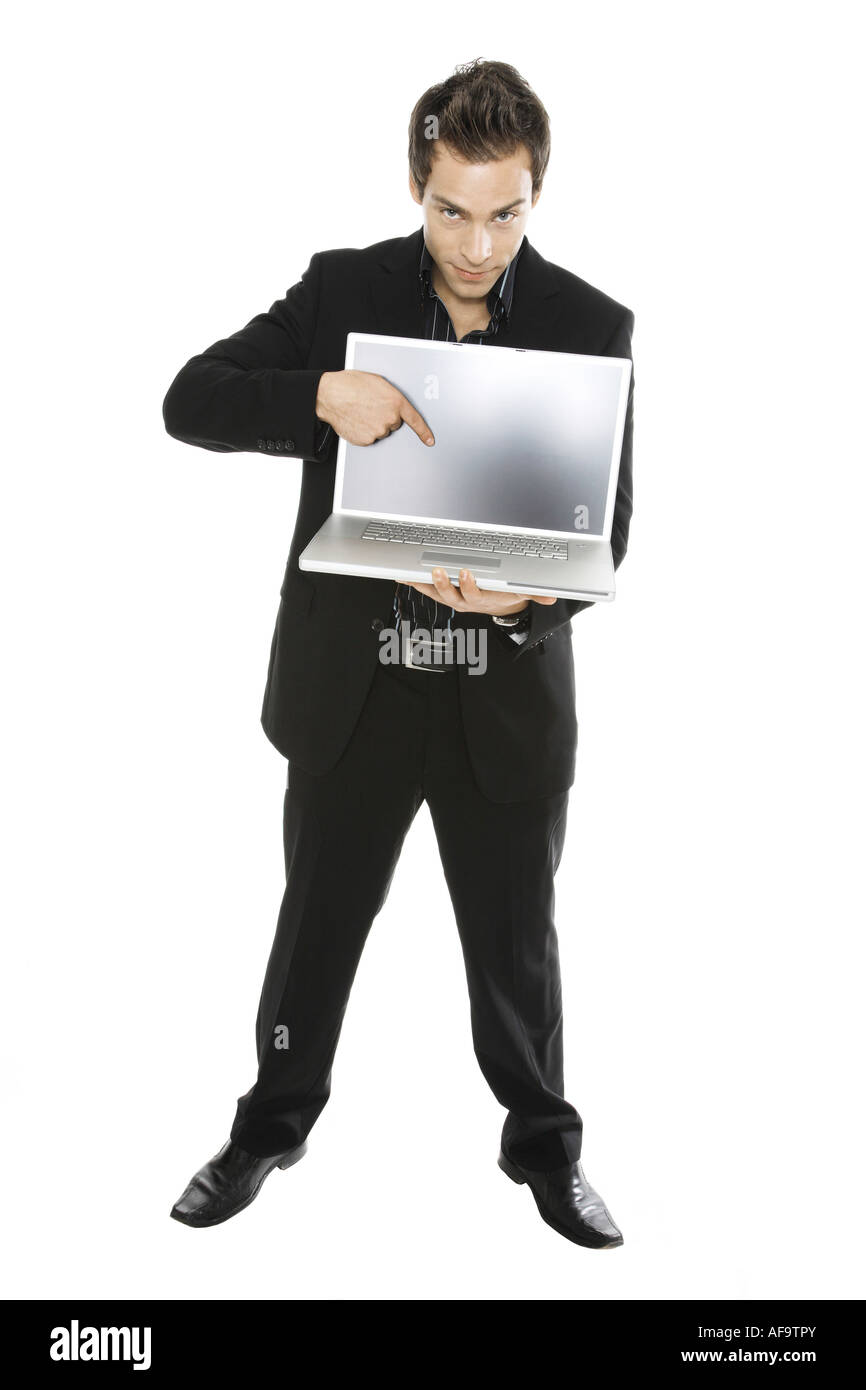 Young man holding laptop, close-up Stock Photo - Alamy