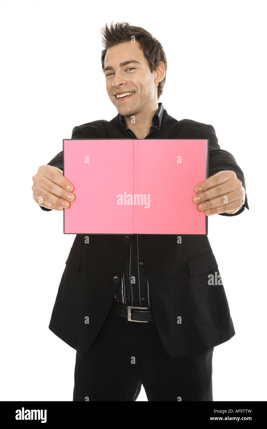 Man holding pink notebook, close-up Stock Photo - Alamy