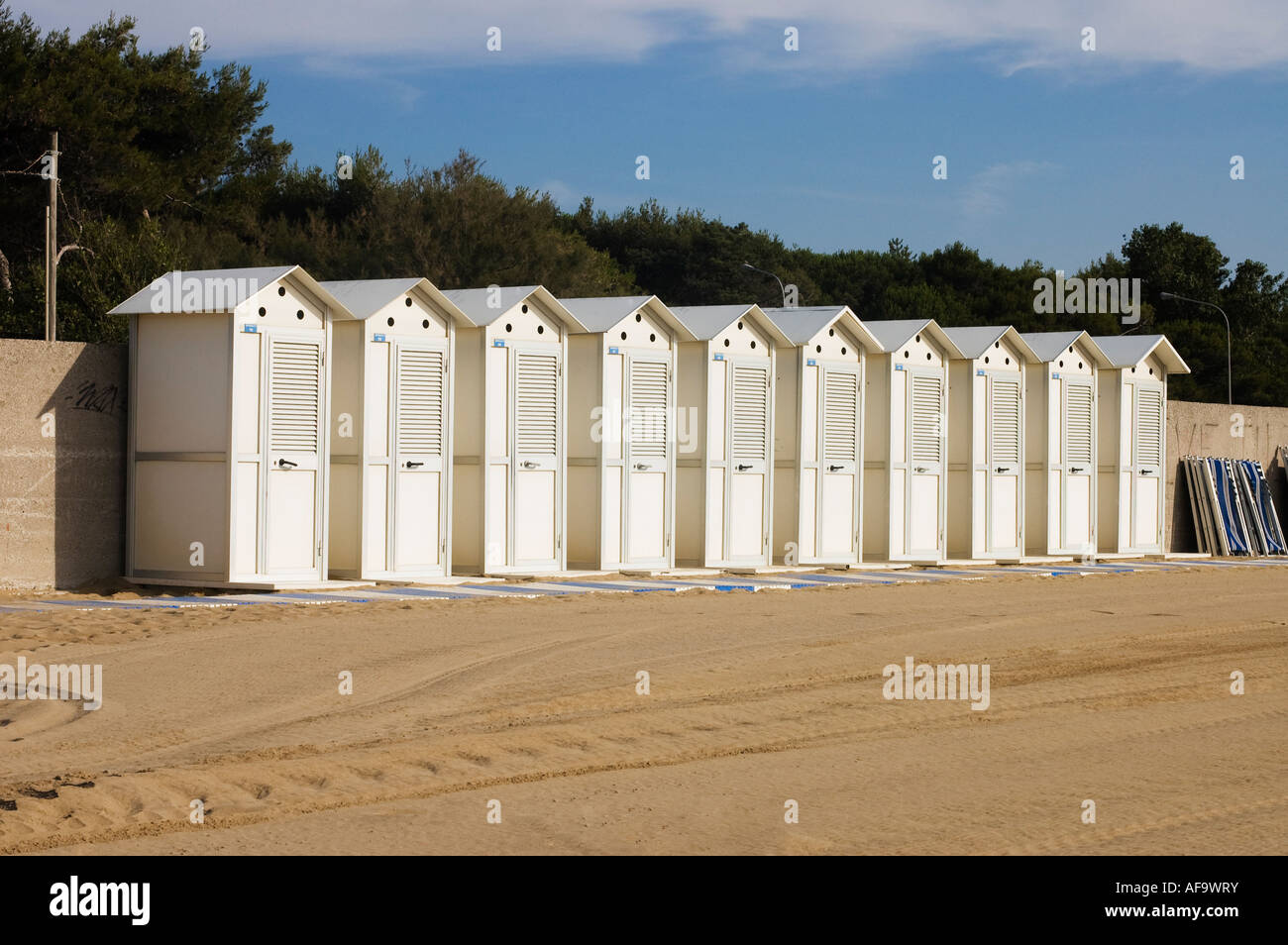 white wooden changing cubicles at sunny beach Stock Photo - Alamy