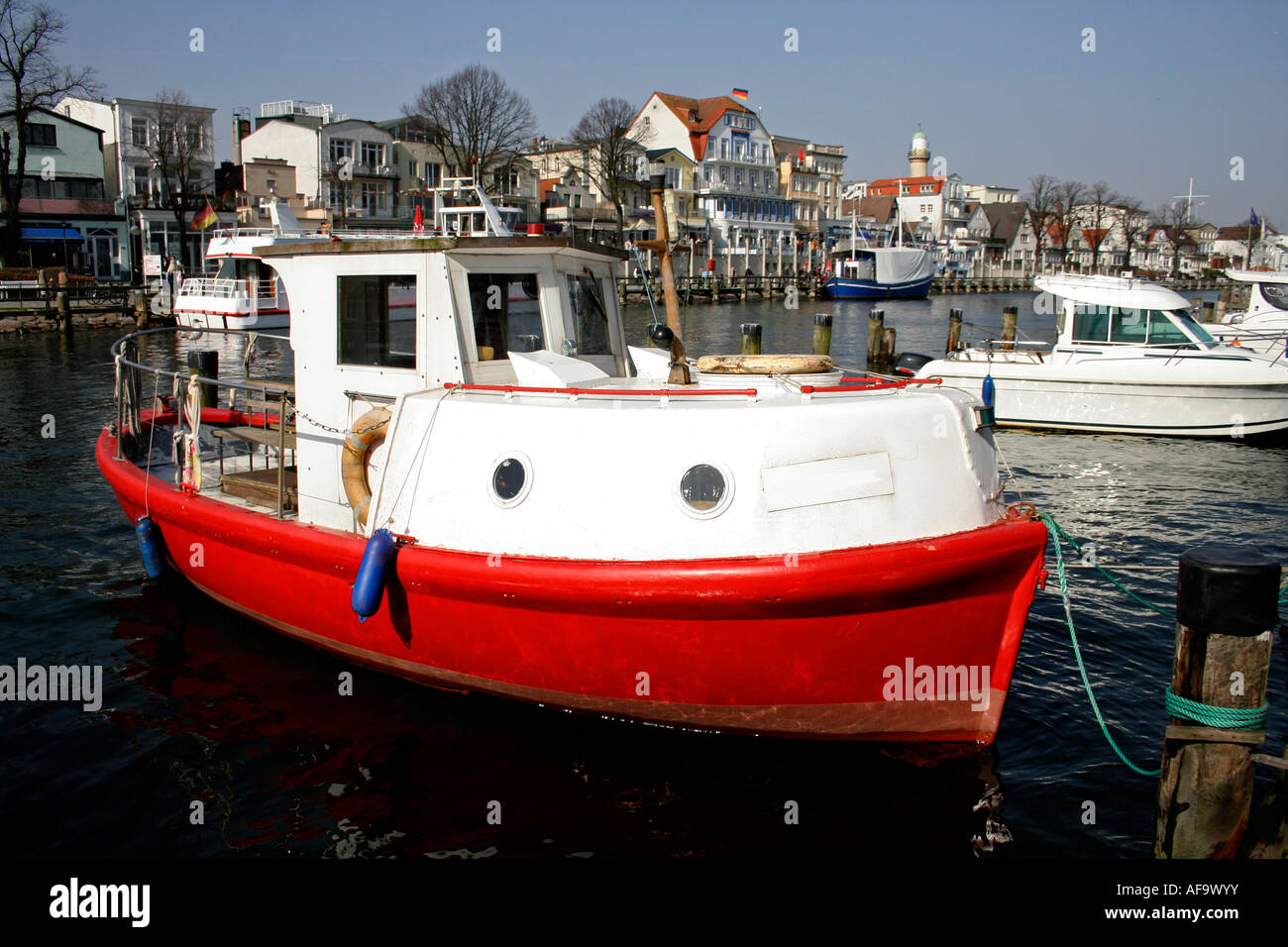 red fishing boat Stock Photo - Alamy