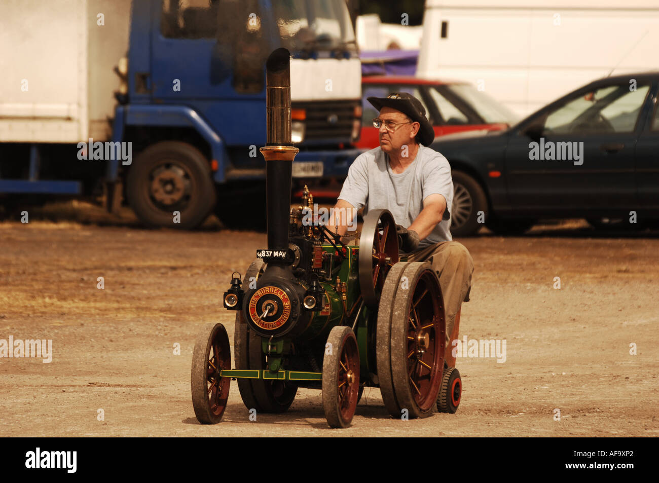 small steam engine in the arena at the wings wheels and steam show on ...