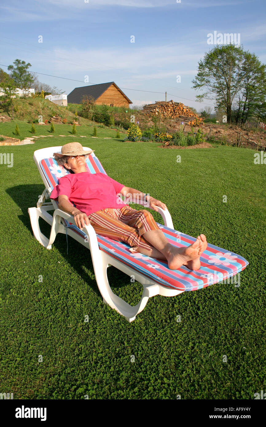 pensioner enjoying free time in the garden Stock Photo - Alamy