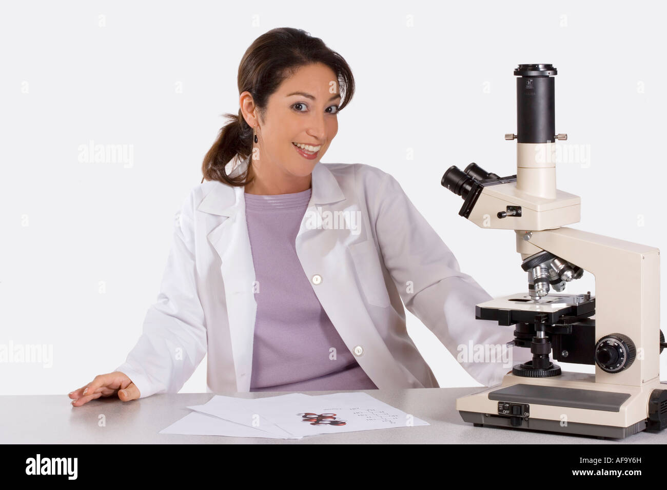 Doctor using microscope check hi-res stock photography and images - Alamy