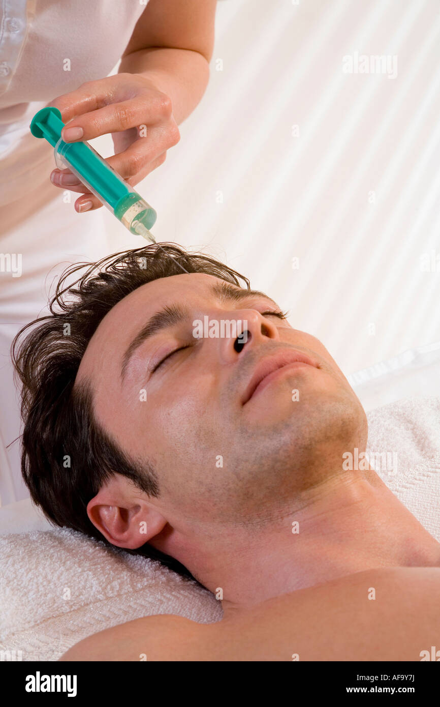 Man receiving botox injection Stock Photo - Alamy