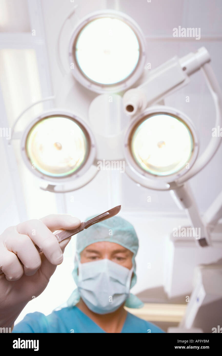 Surgeon with scalpel Stock Photo - Alamy