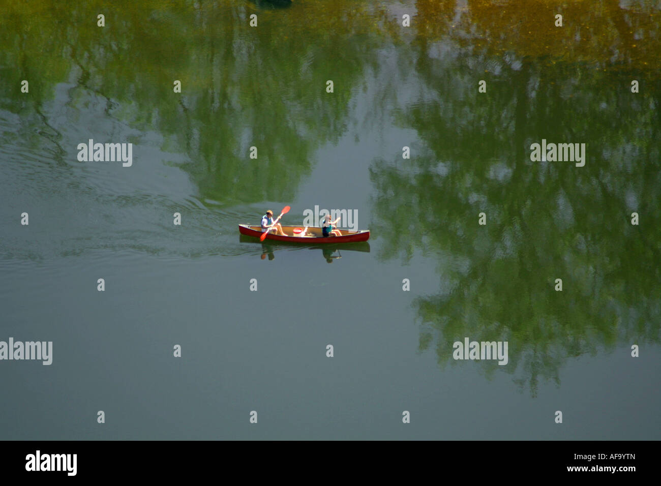 couple canoeing down the river in summer Stock Photo - Alamy