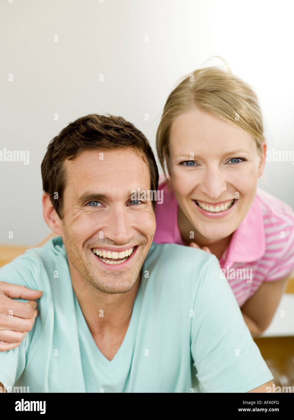 Couple smiling, portrait Stock Photo - Alamy