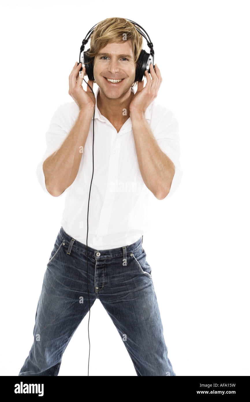 Man wearing head phones, close-up Stock Photo - Alamy