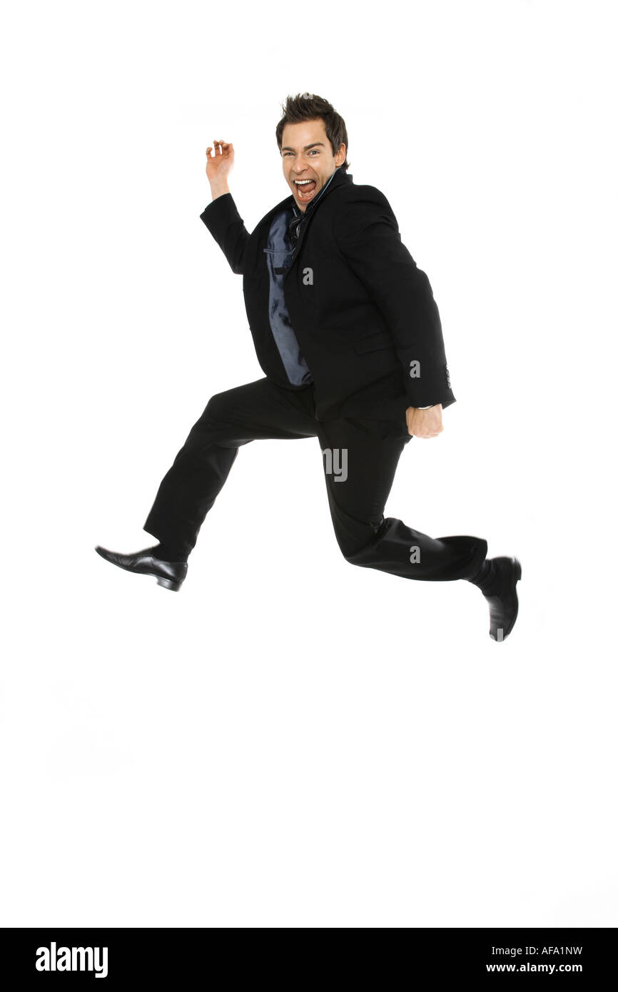 Young man jumping, close-up Stock Photo - Alamy