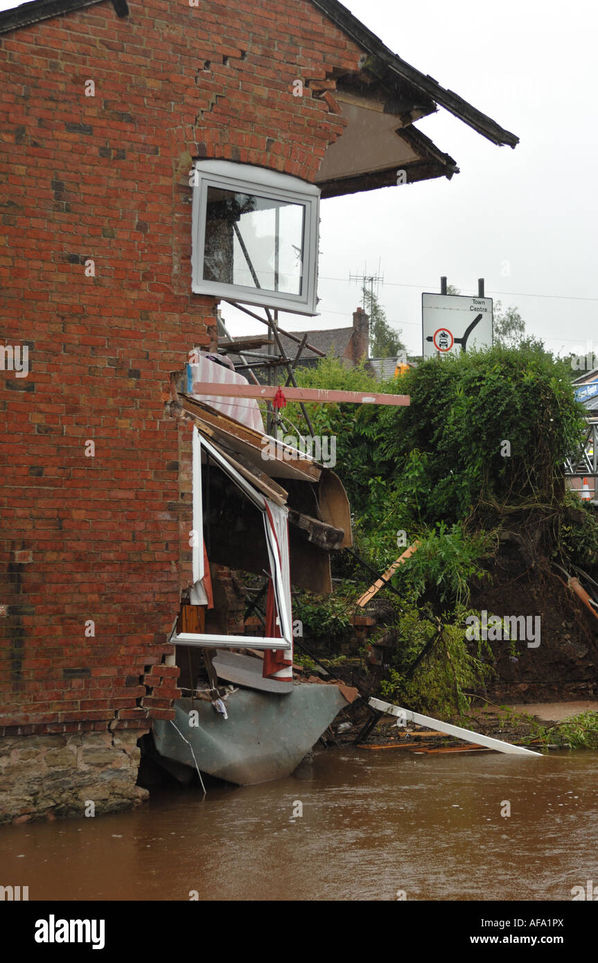 House collapsed into river after flooding of the river Corve in Ludlow ...