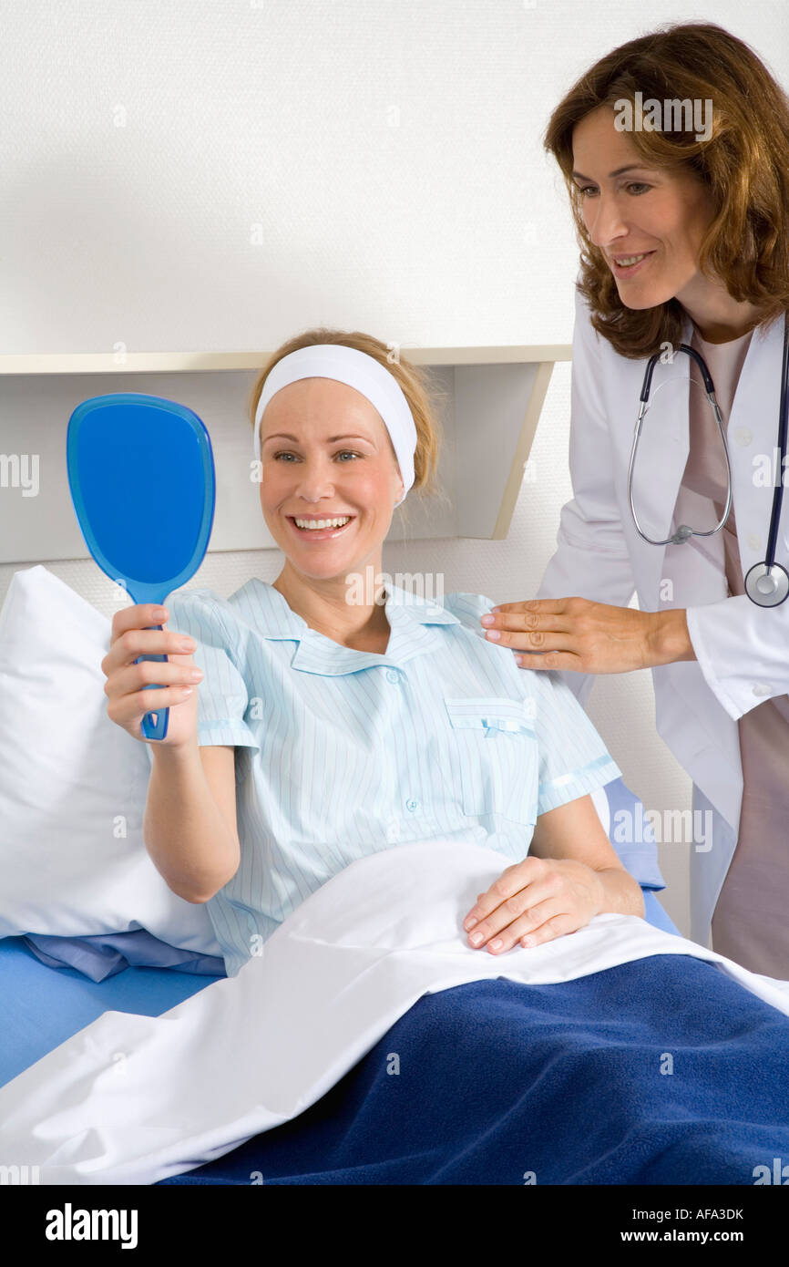 Female cosmetic surgeon talking to female patient Stock Photo - Alamy