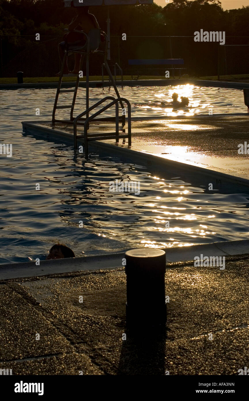 A public swimming pool at dusk Stock Photo - Alamy