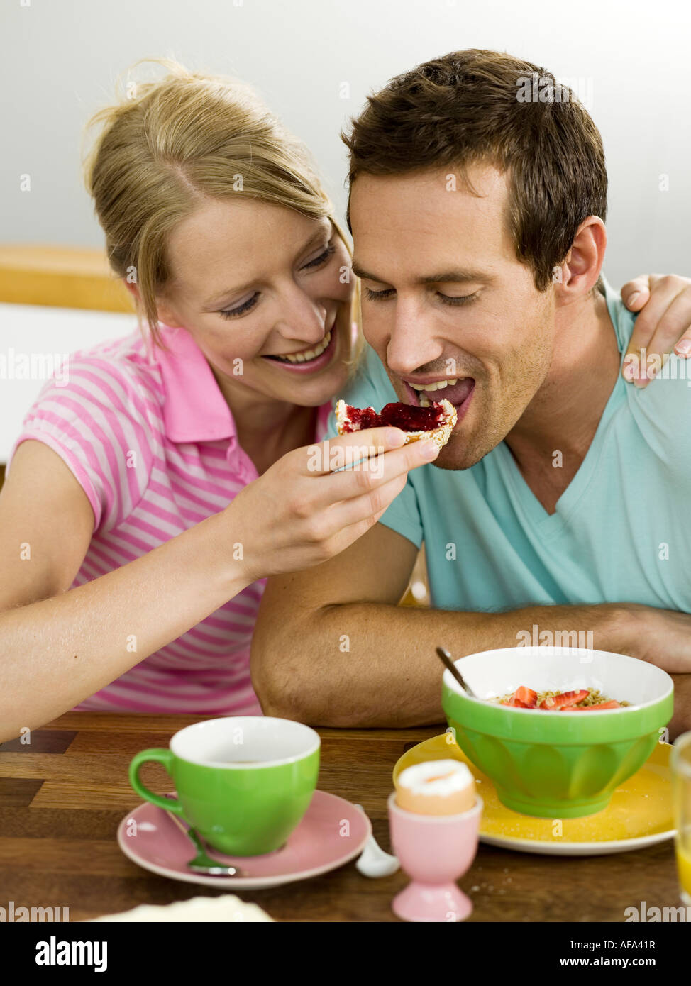 Couple having breakfast Stock Photo - Alamy