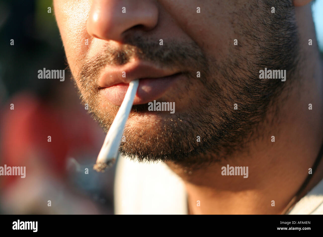 smoking face close up Stock Photo - Alamy