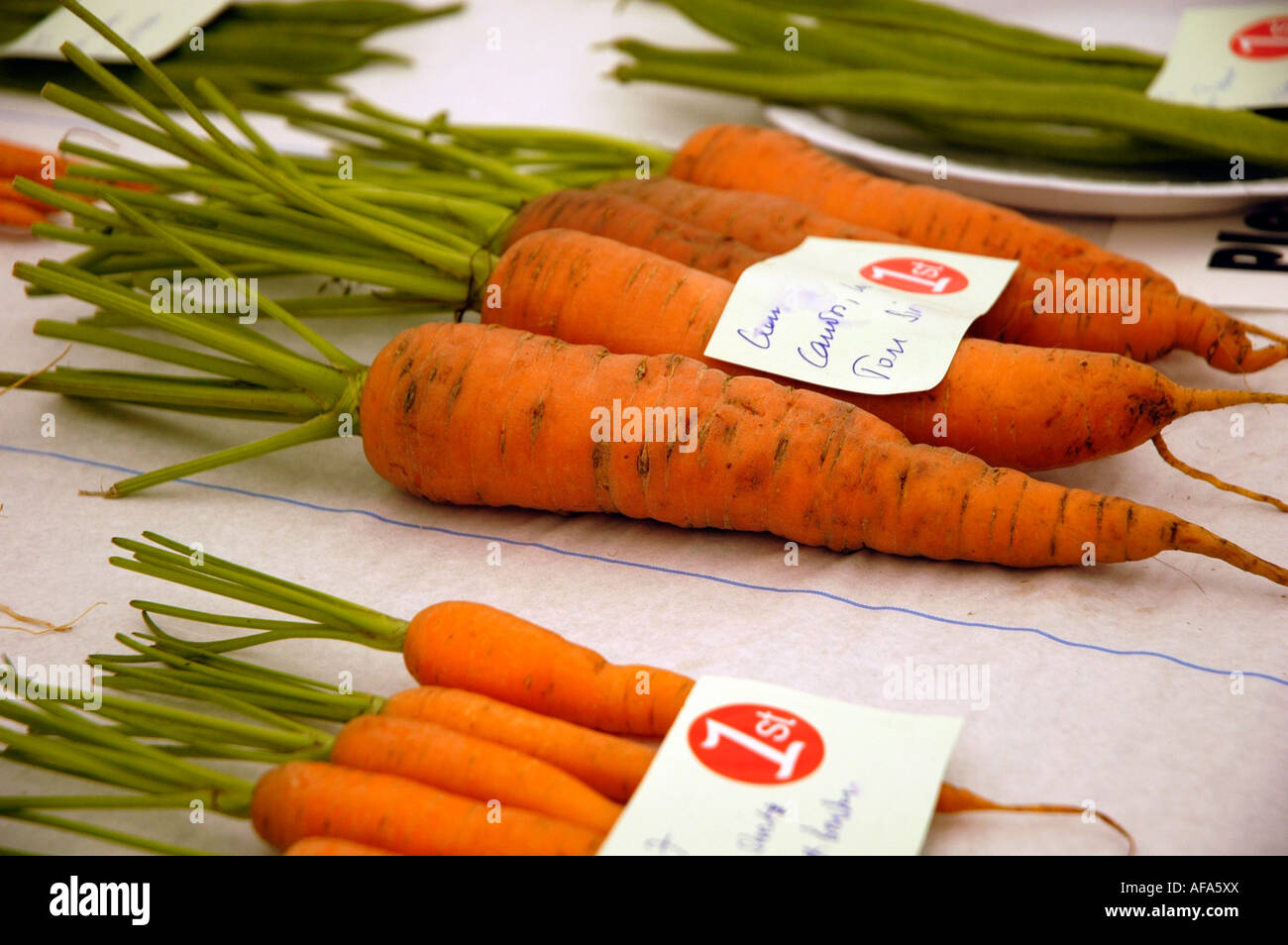 prize carrots in village show Stock Photo - Alamy