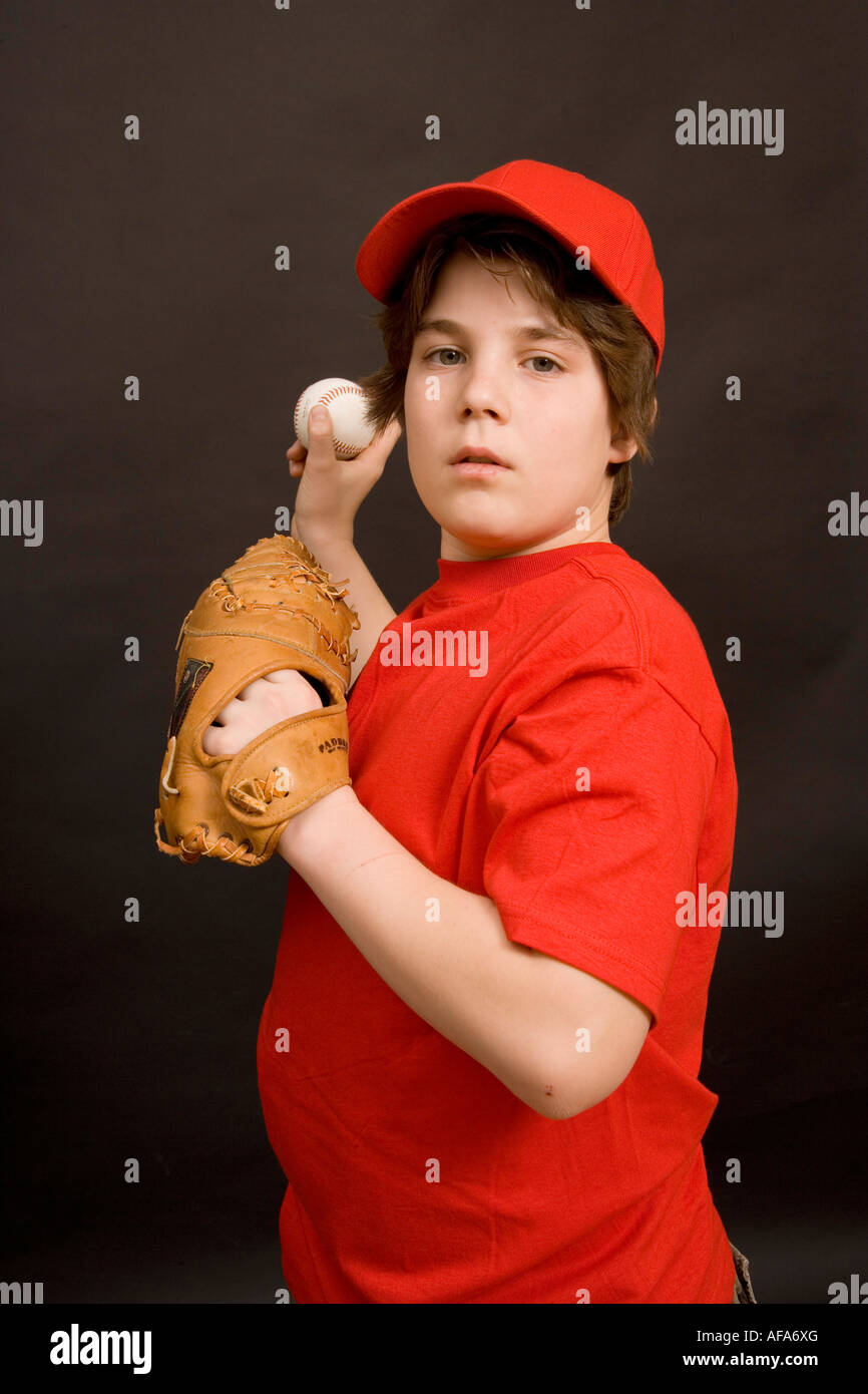Young boy readies to throw a baseball Stock Photo - Alamy