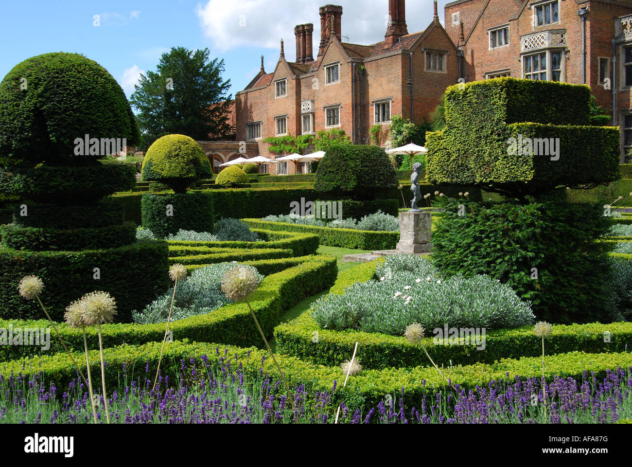 Manicured hedges and topiary gardens of Great Fosters Hotel, Egham ...