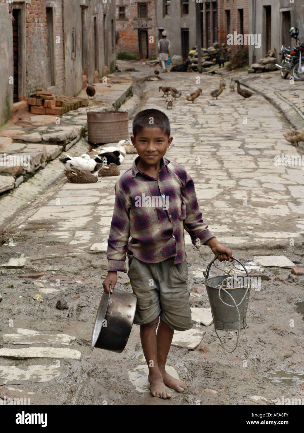 Poor barefoot boy hi-res stock photography and images - Alamy