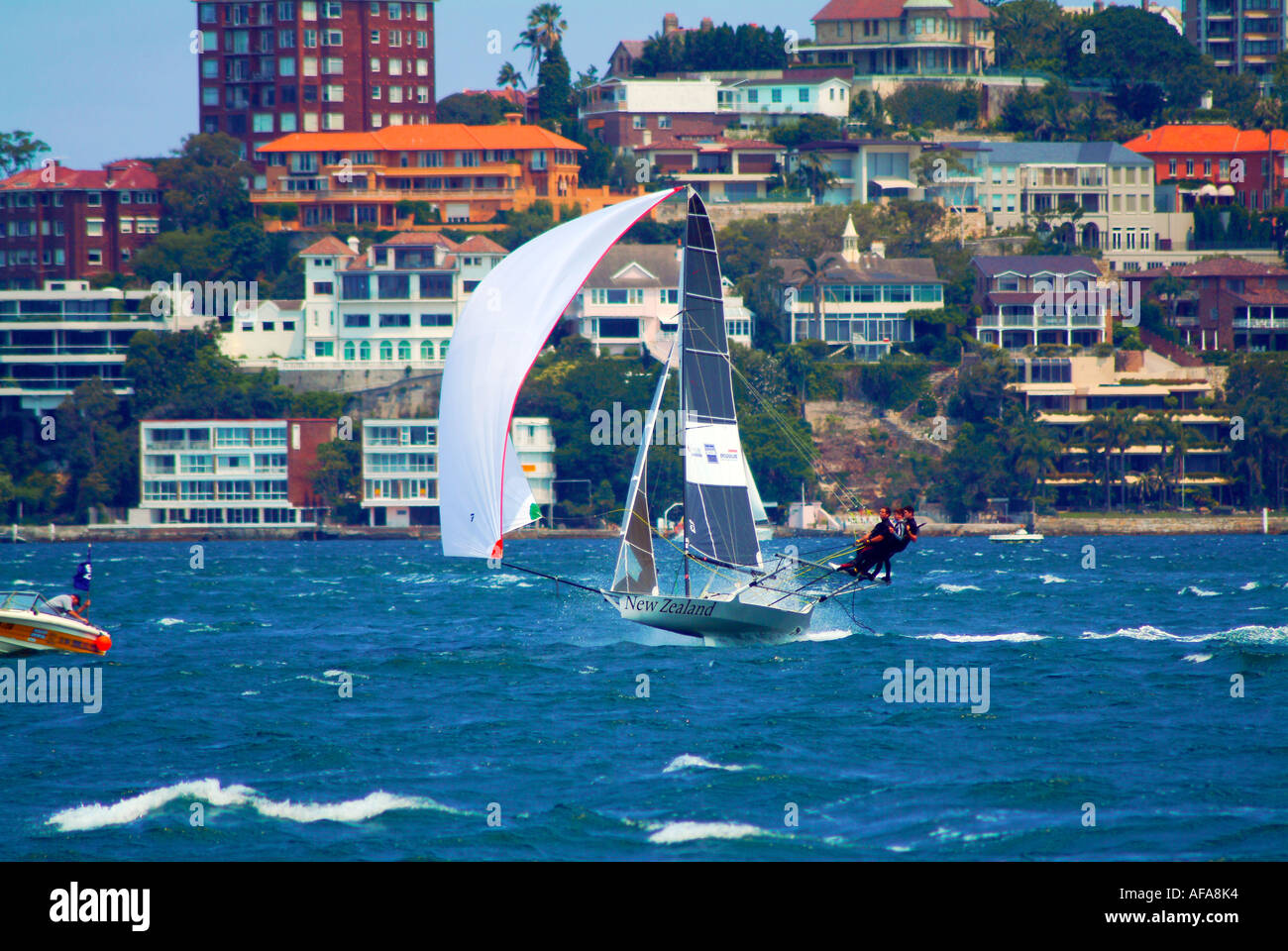 18 foot skiff sailing on sydney harbour australia Stock Photo - Alamy