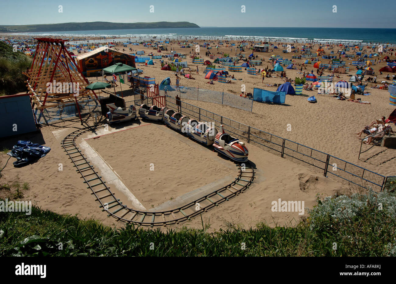 A busy beach scene taken at Woolacombe, North devon uk Stock Photo - Alamy