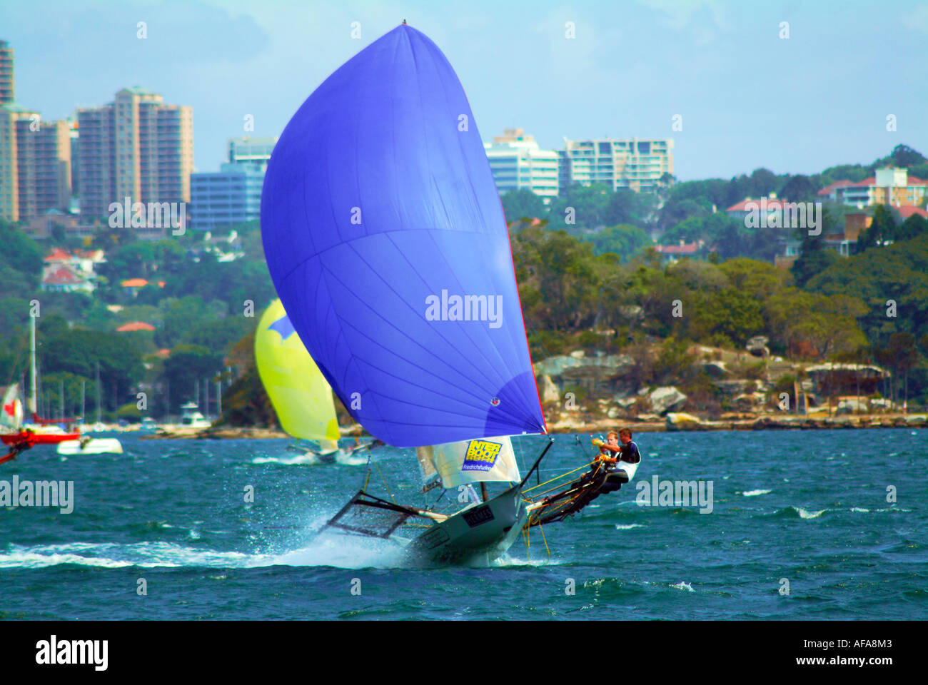 18 foot skiff sailing on sydney harbour australia Stock Photo - Alamy