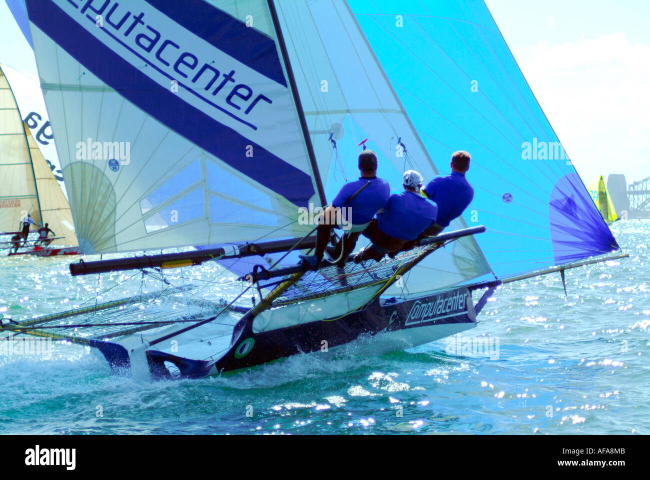18 foot skiff sailing on sydney harbour australia Stock Photo - Alamy