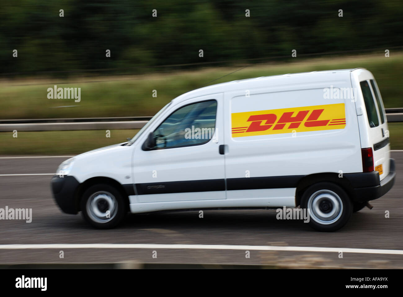 DHL delivery van on motor way in UK Stock Photo - Alamy