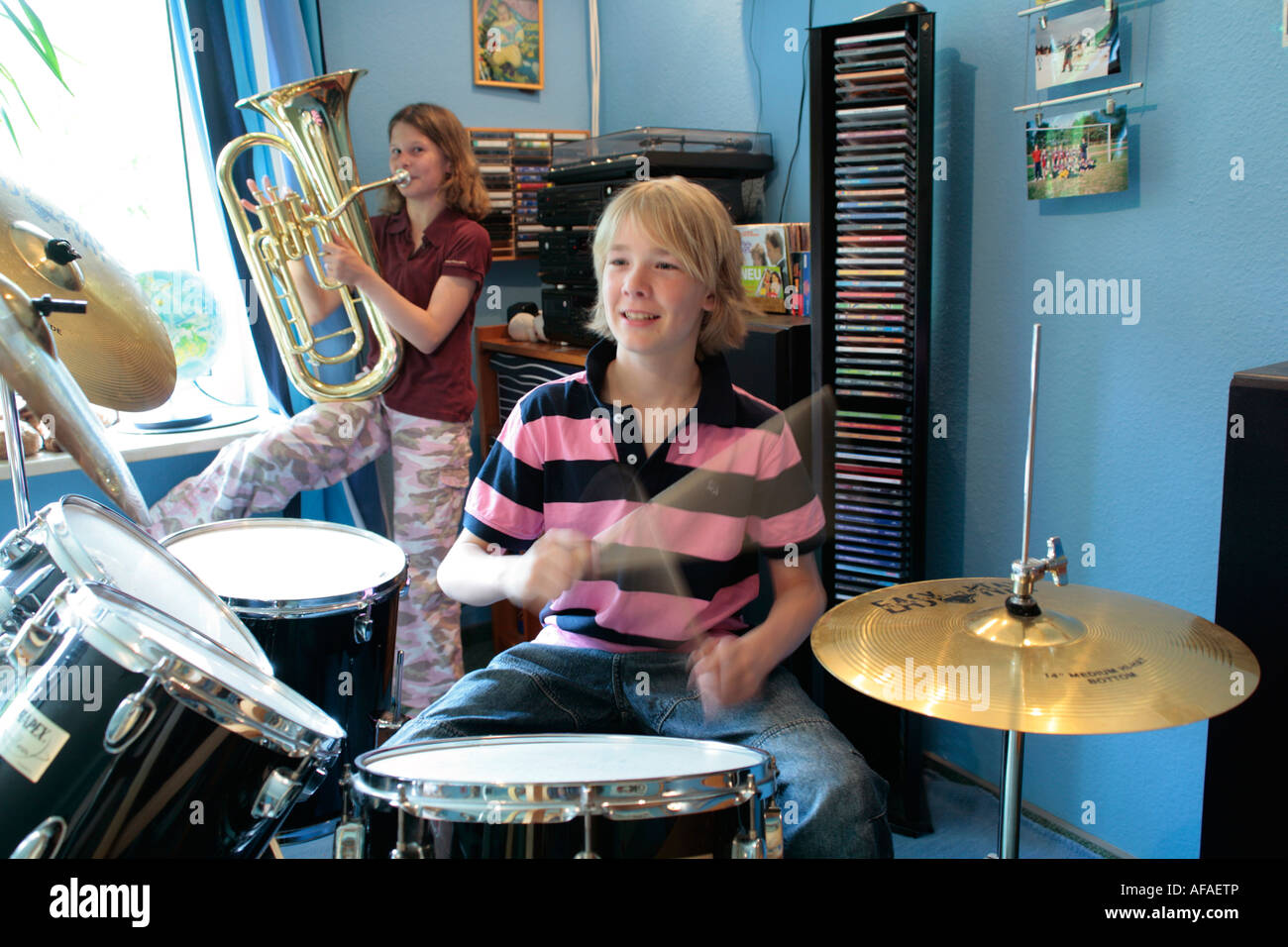 Children playing musical instruments hi-res stock photography and ...
