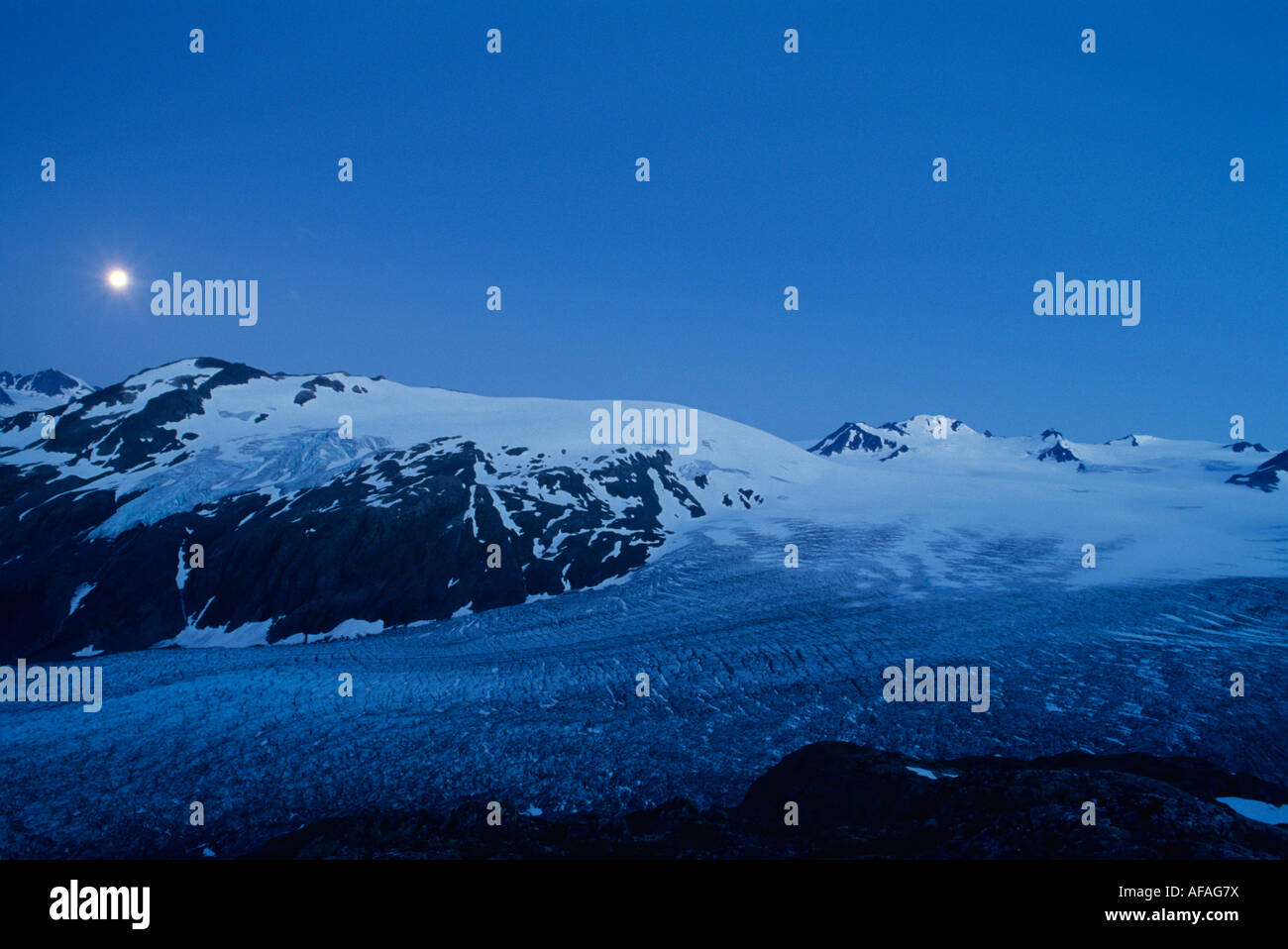 USA Alaska Kenai Fjords National Park Full moon rises above Exit ...