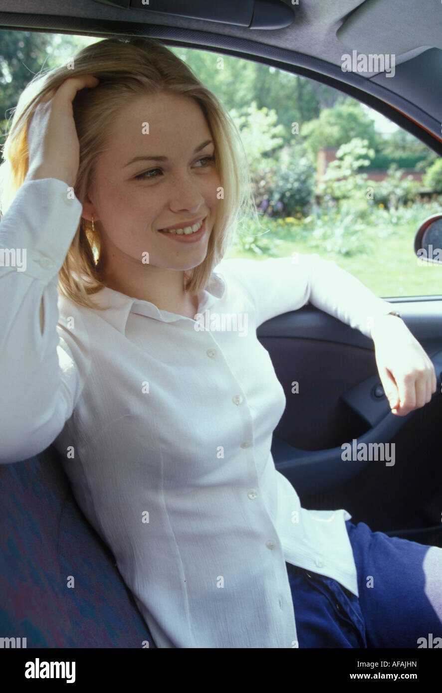 woman sitting in a car Stock Photo - Alamy