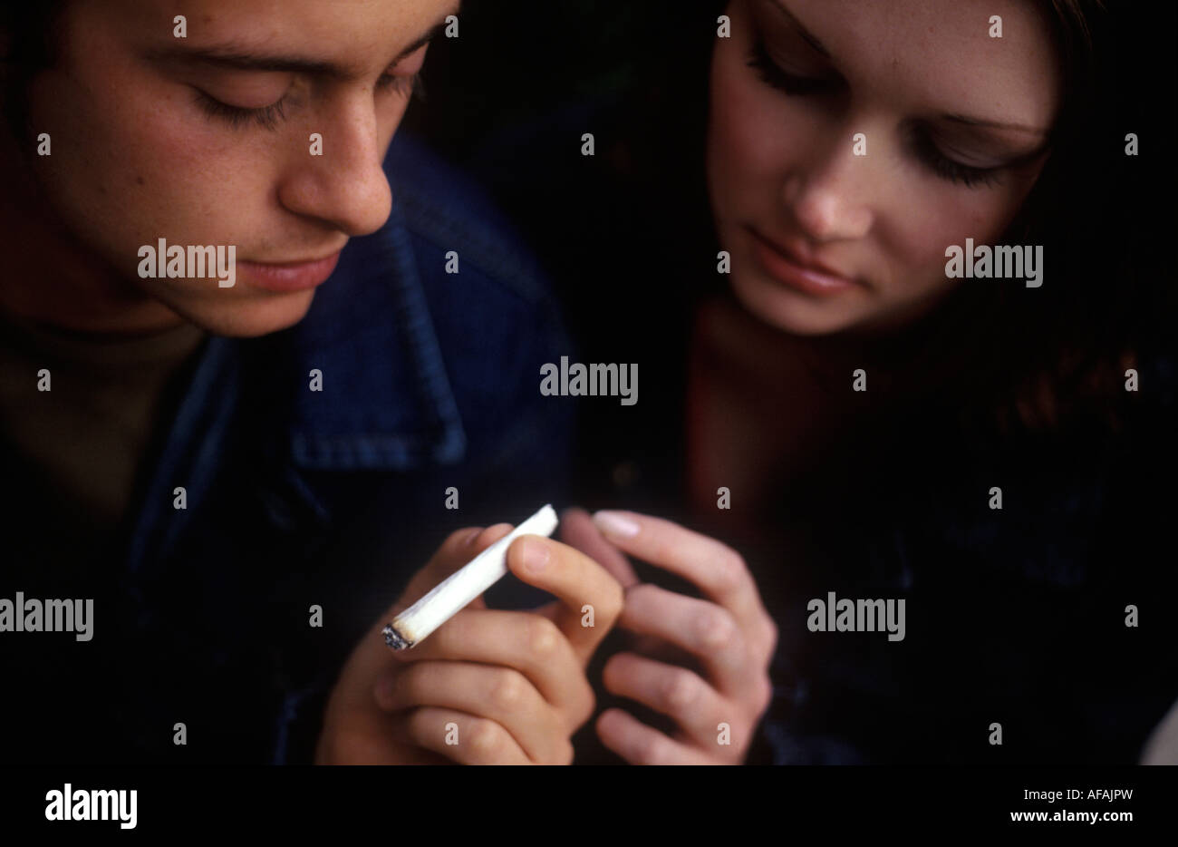 Passing joint hi-res stock photography and images - Alamy
