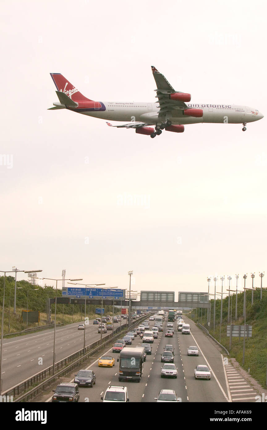 a plane coming in to land at East midlands airport flying low over a ...