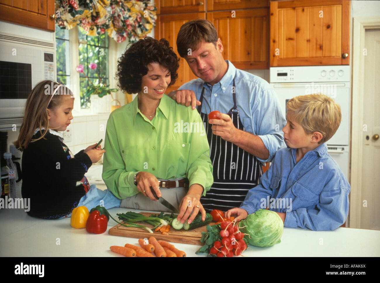family preparing a meal Stock Photo - Alamy