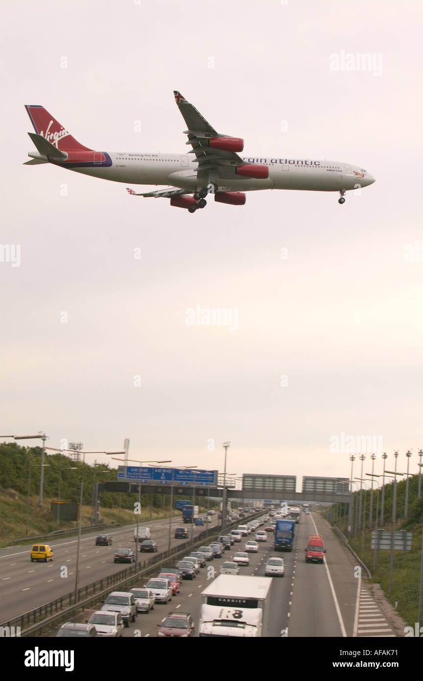 a plane coming in to land at East midlands airport flying low over a ...