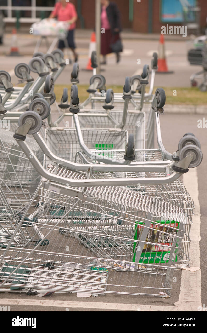 shopping trolleys tipped upside down at an Asda store in Barrow in ...