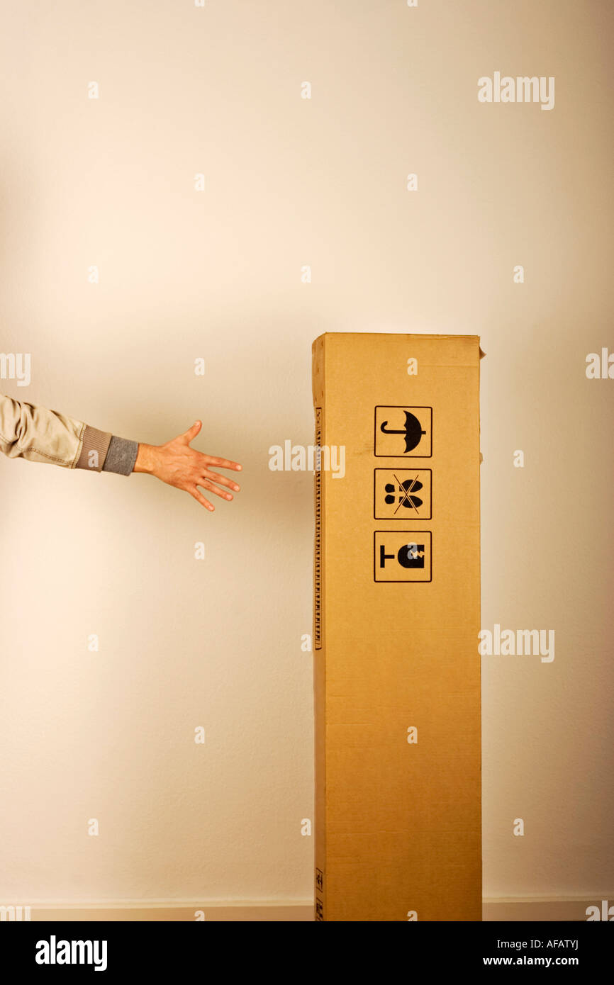 Man pointing carton Stock Photo - Alamy