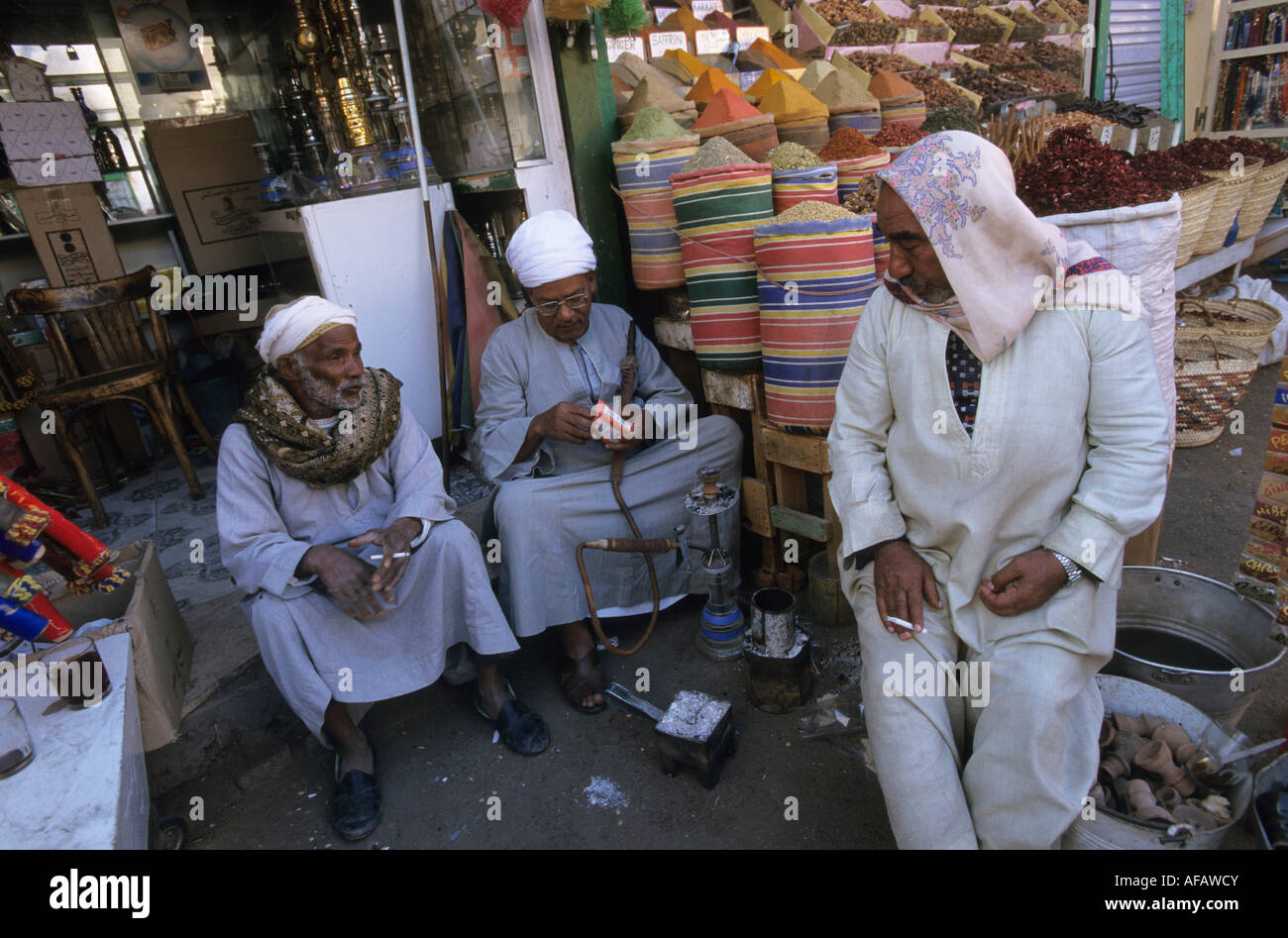 Egypt Aswan People sitting at market Stock Photo - Alamy