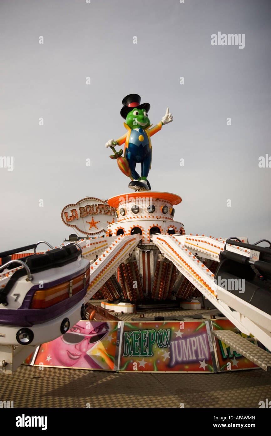 An empty fairground ride with a model of Jimny Cricket on top at ...