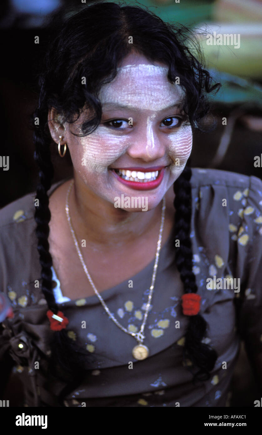 Mandalay girl with thanaka powder sun block on her face Stock Photo - Alamy