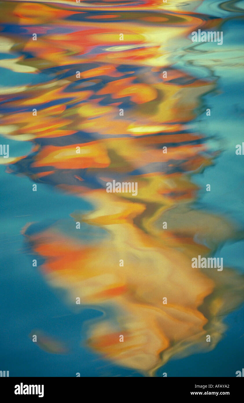 Pattern of colors reflected on the surface of water Stock Photo - Alamy