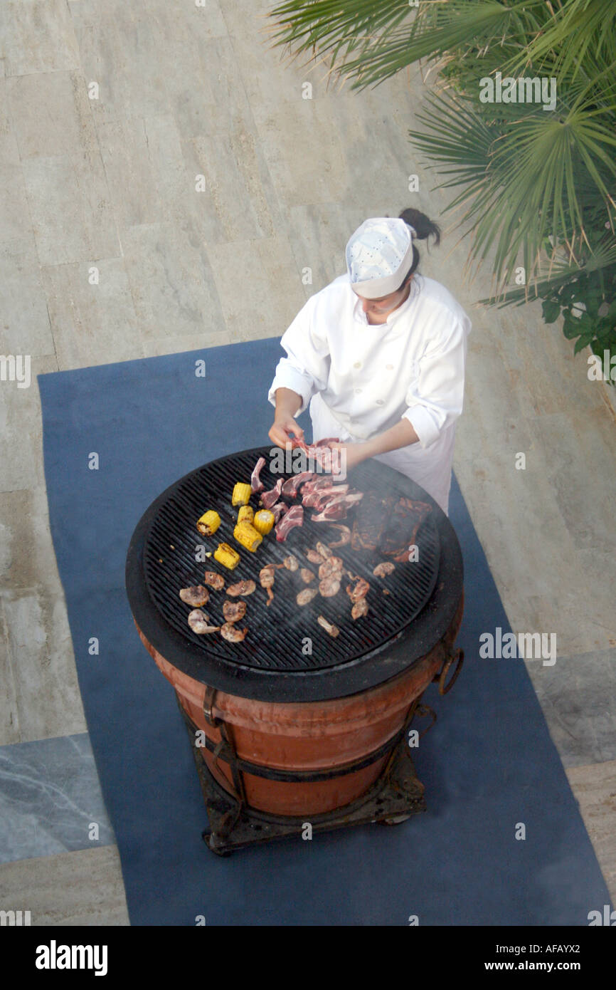 Female chef cooking barbeque hi-res stock photography and images - Alamy