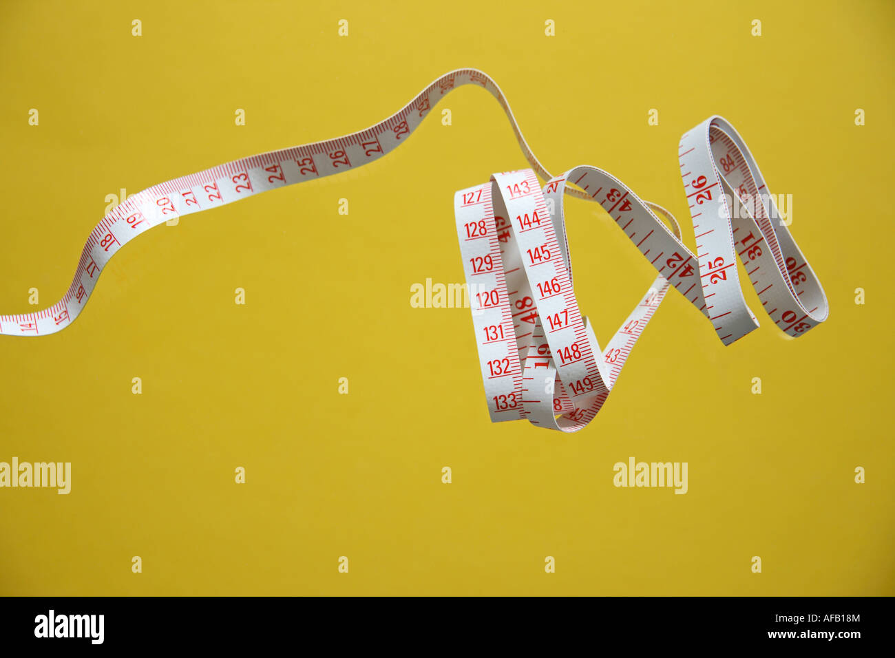 Coiled measuring tape, close-up Stock Photo - Alamy Coiled measuring tape, close-up Stock Photo - Alamy