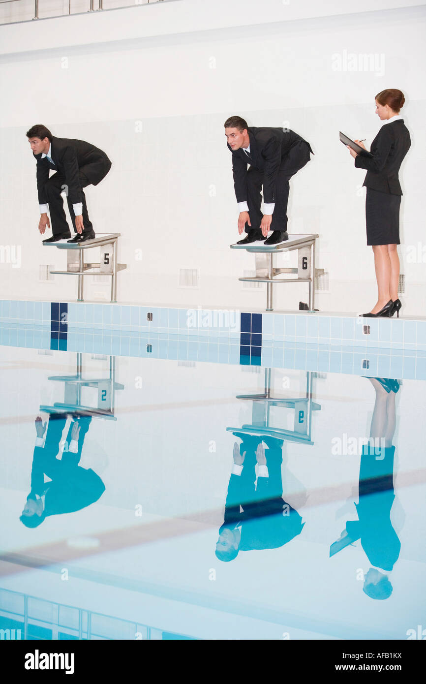 Starting blocks in suit hi-res stock photography and images - Alamy