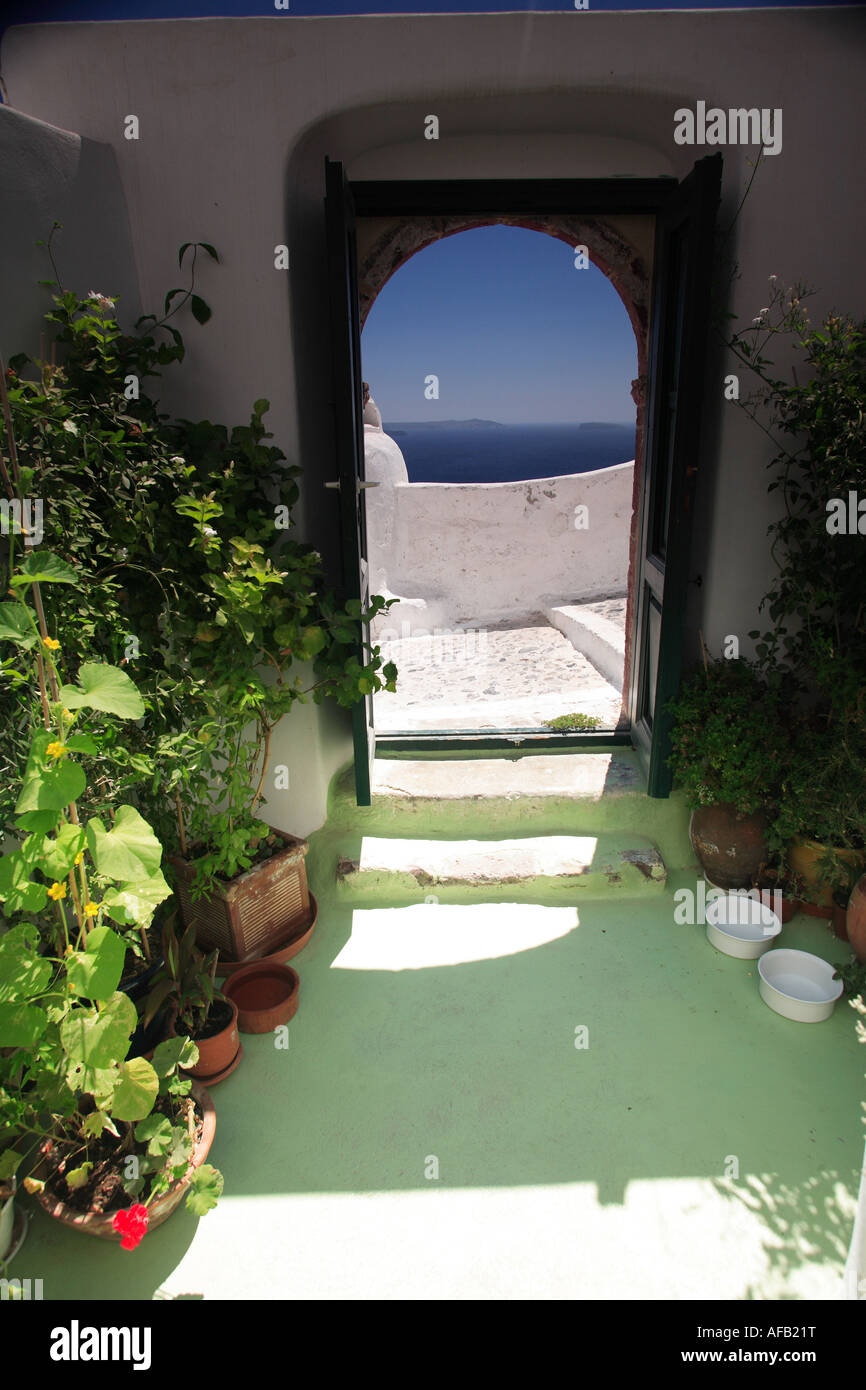 authentic greek courtyard with arched doorway and foliage Stock Photo ...