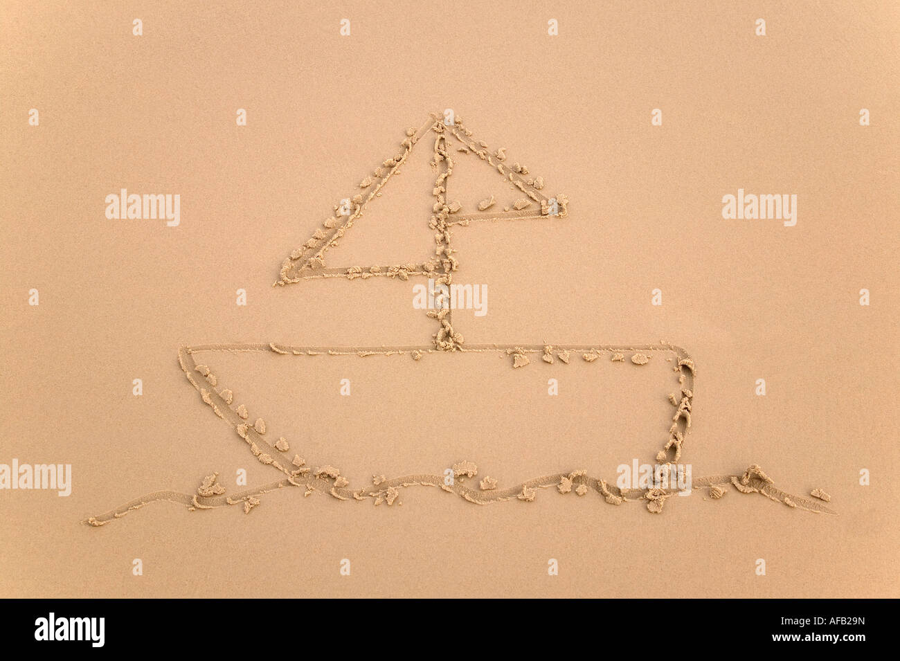 Drawing of a boat in sand Stock Photo - Alamy