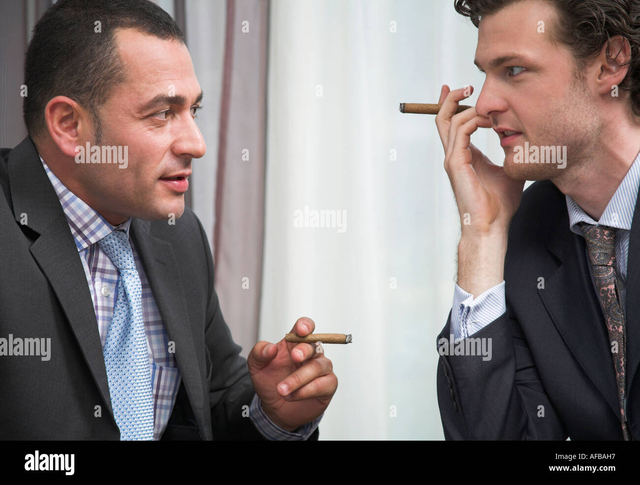 With small cigar hi-res stock photography and images - Alamy